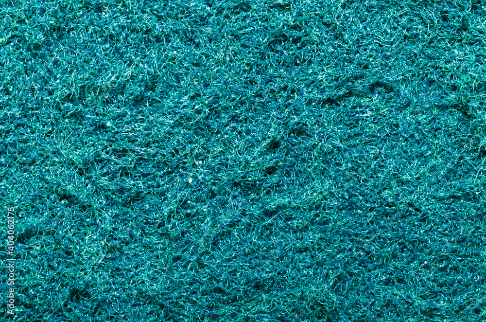 Abstract top view of green synthetic fiber texture background. Close-up ...