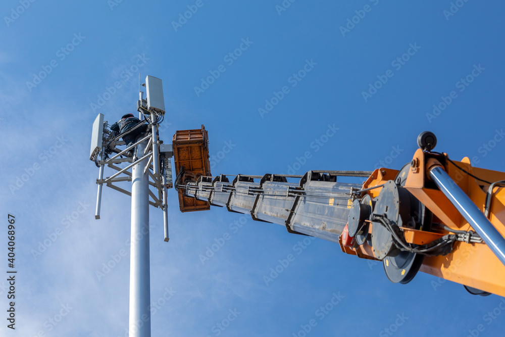 Crane with telescopic boom lift used as an aerial working platform ...