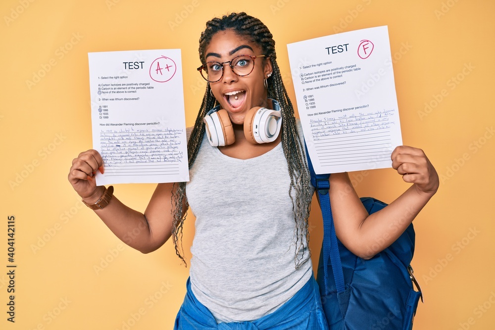 Young african american woman with braids showing failed and passed exam ...