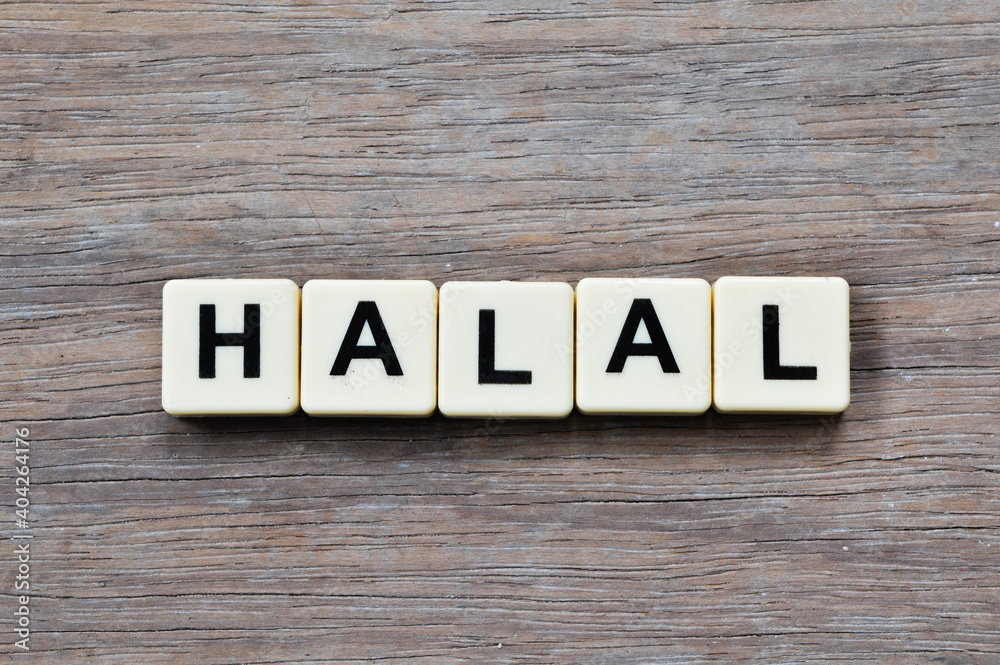 Top view of alphabet letters with text HALAL. Halal is an Arabic word ...