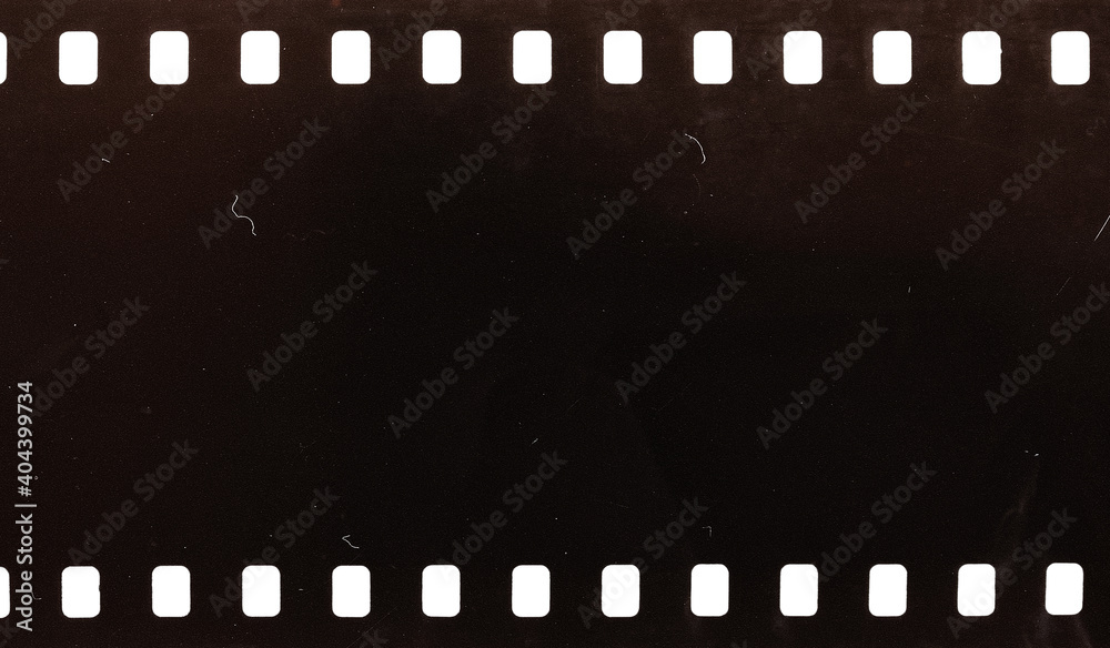 Dusty and grungy 35mm film texture material or surface. Dust particle ...