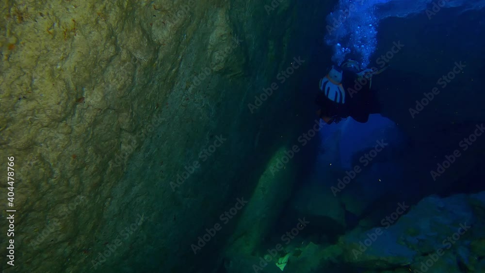 Scuba diving in Malta - Gozo Diving - Following a diver swimming under ...