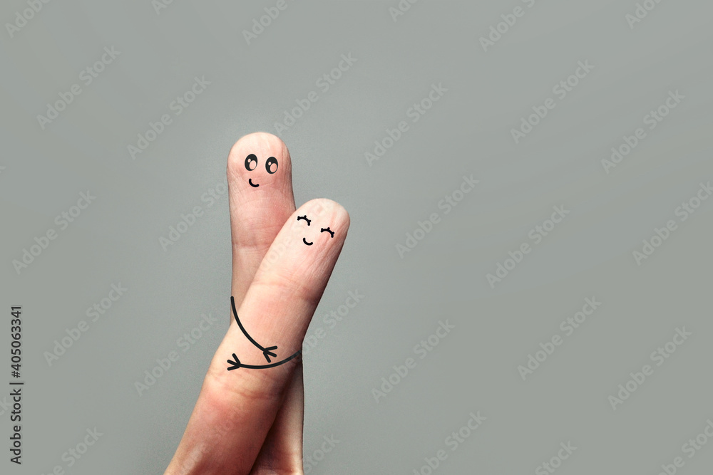 Two fingers with smiling faces hug each other. World Hug Day Stock ...