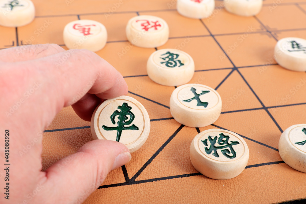 Chinese chess, people playing chinese chess Stock Photo | Adobe Stock