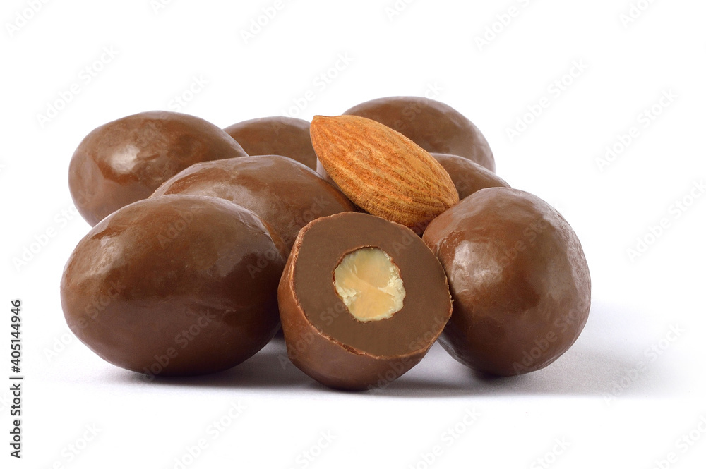 chocolate dragees as white background, Soft Chocolate with Almond ...