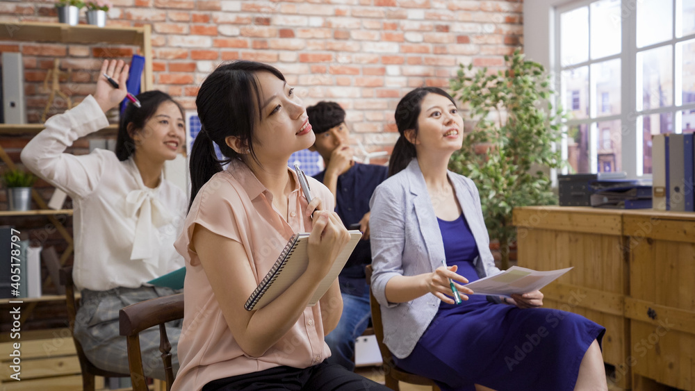 asian charming woman worker raise hand asking question in meeting ...