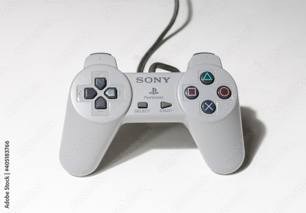 london, uk 05/05/2020 A wired official play station 1 ps1 controller on ...