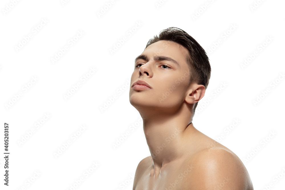Confidence. Portrait of young man isolated on white studio background ...