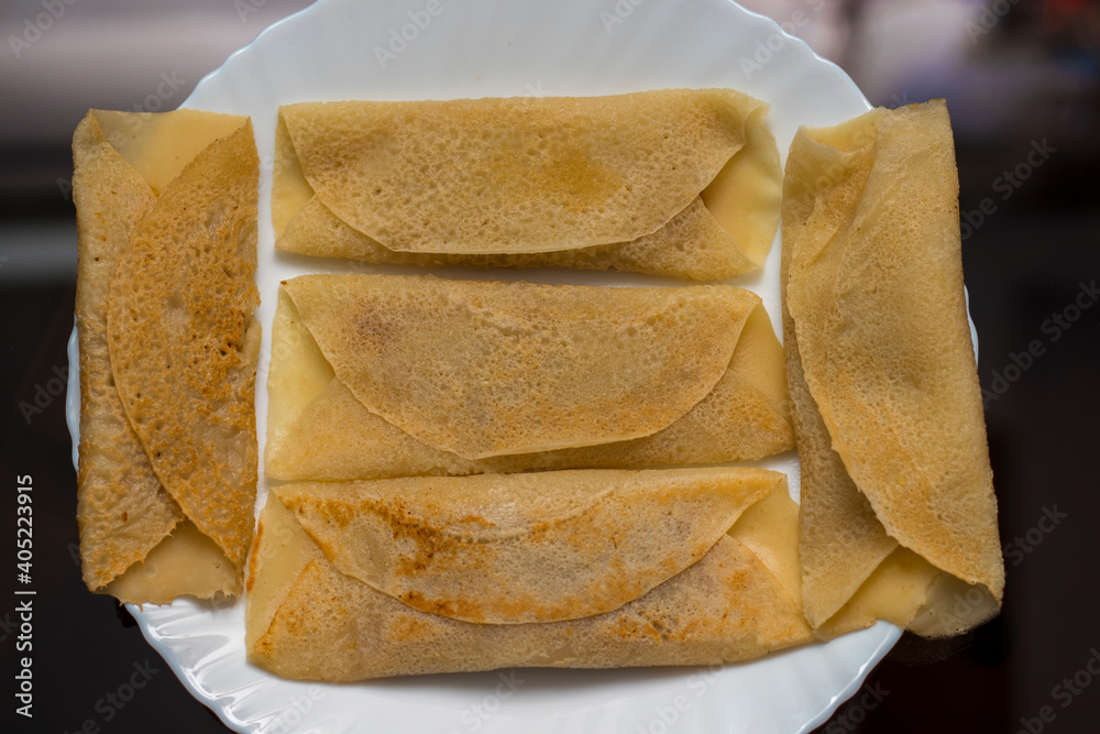 Patishapta is a sweet food made of rice powder and milk.famous among ...
