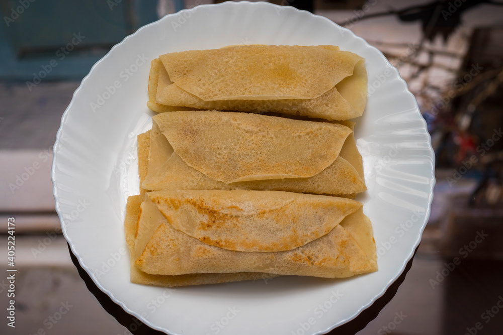 Patishapta is a sweet food made of rice powder and milk.famous among ...
