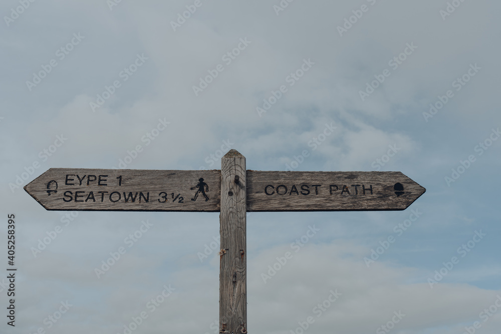 Direction signs along the coastal South West Coast Path route on ...