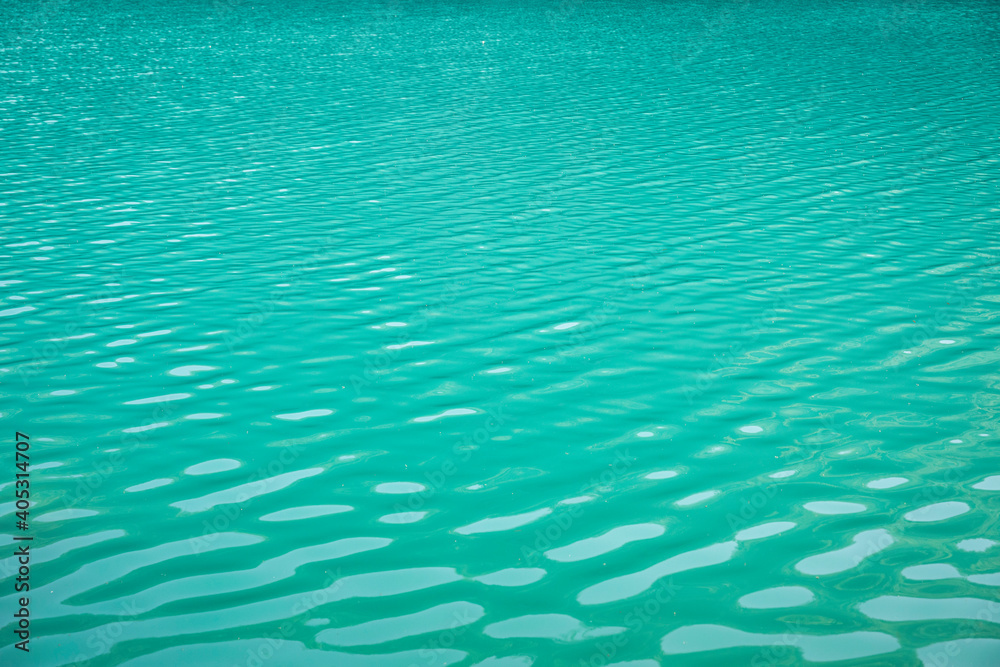 Turquoise lake surface Stock Photo | Adobe Stock