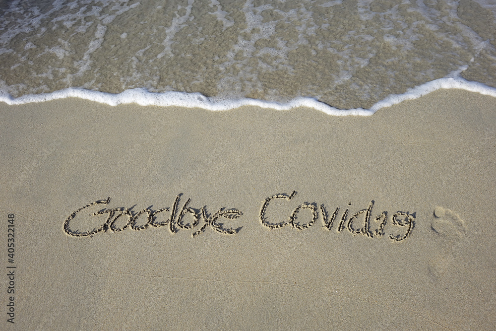 Beach sand messages : Goodbye Covid-19 written in the sand on beach ...