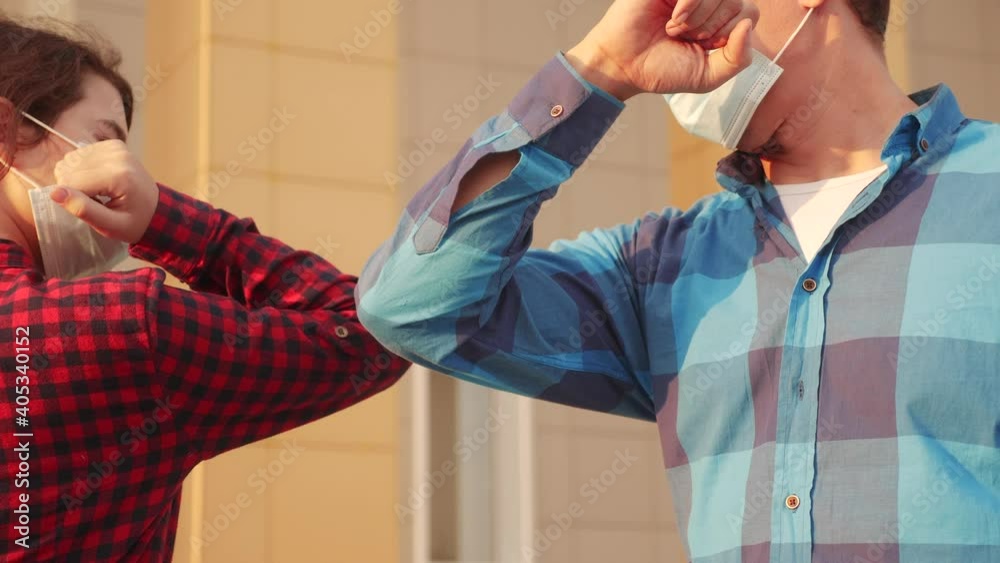 dad and daughter touch elbows social distance. bump avoid greeting ...