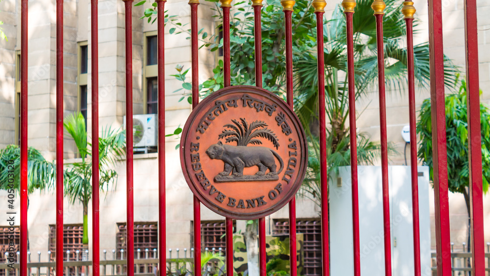 Reserve Bank of India (RBI) logo on the closed iron gate of New Delhi ...