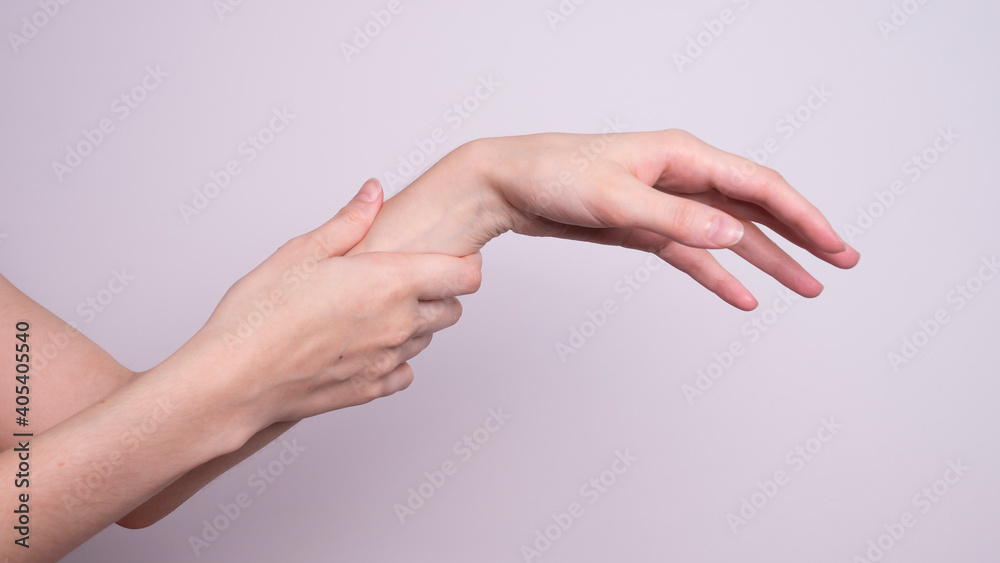 Parkinson's disease symptoms. Close up of tremor (shaking) hands of ...