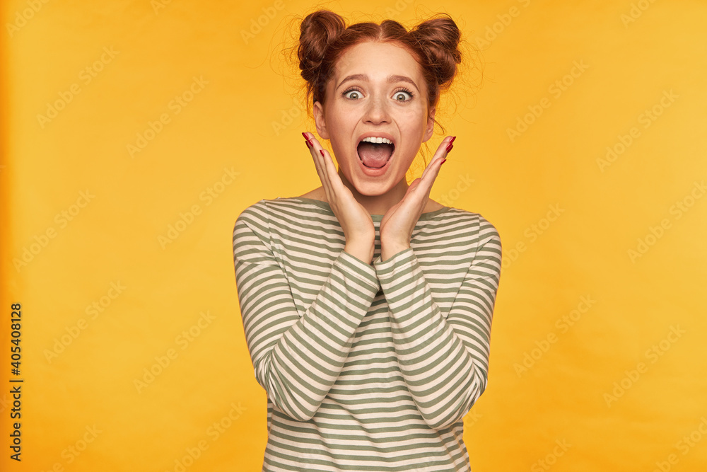 Young lady, horrified looking ginger woman with two buns. Shows how ...