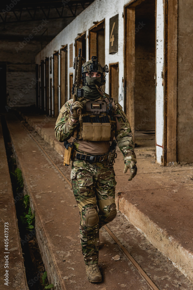 Special forces soldier doing tactical training in building clearing ...