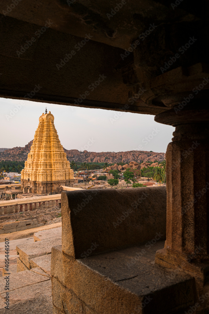 Impressive tower in ancient Virupaksha Temple complex in Hampi region ...
