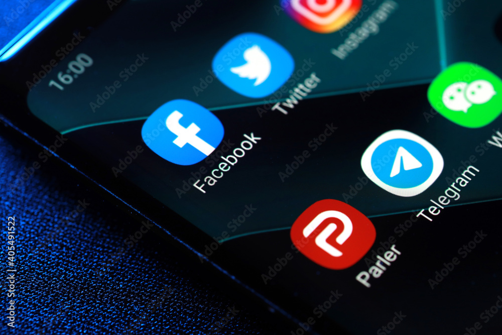 Android phone with various social media icons application Parler social ...