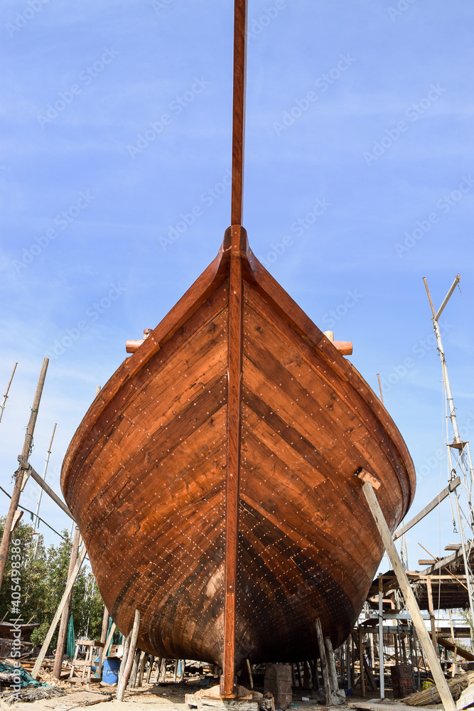 Frontal view of a wooden dhow (a traditional arabian sailing vessel ...