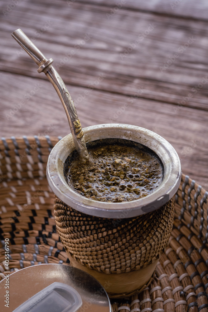 close-up of mat wood and yerba bulb and water at 80 degrees of hot ...
