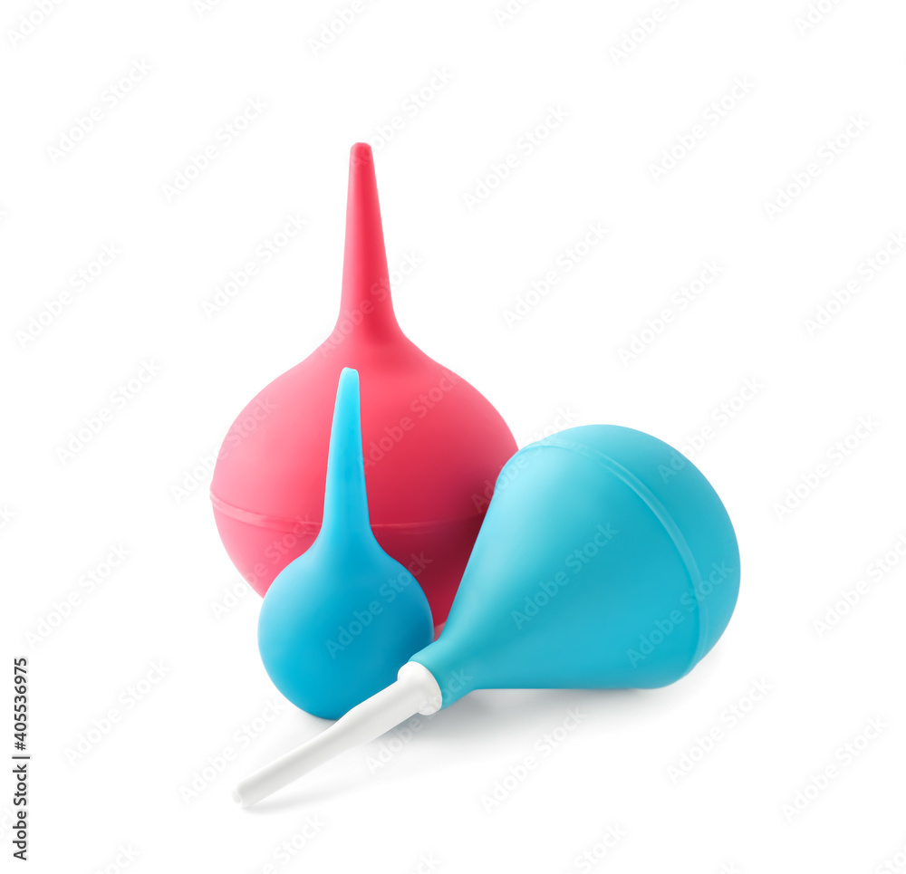 Different enemas on white background. Medical treatment Stock Photo ...