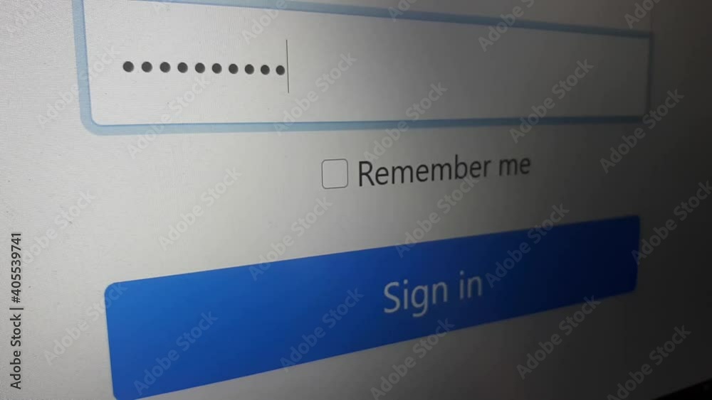 Closeup entering password. Someone entering their password on a computer screen. Log in to your ...