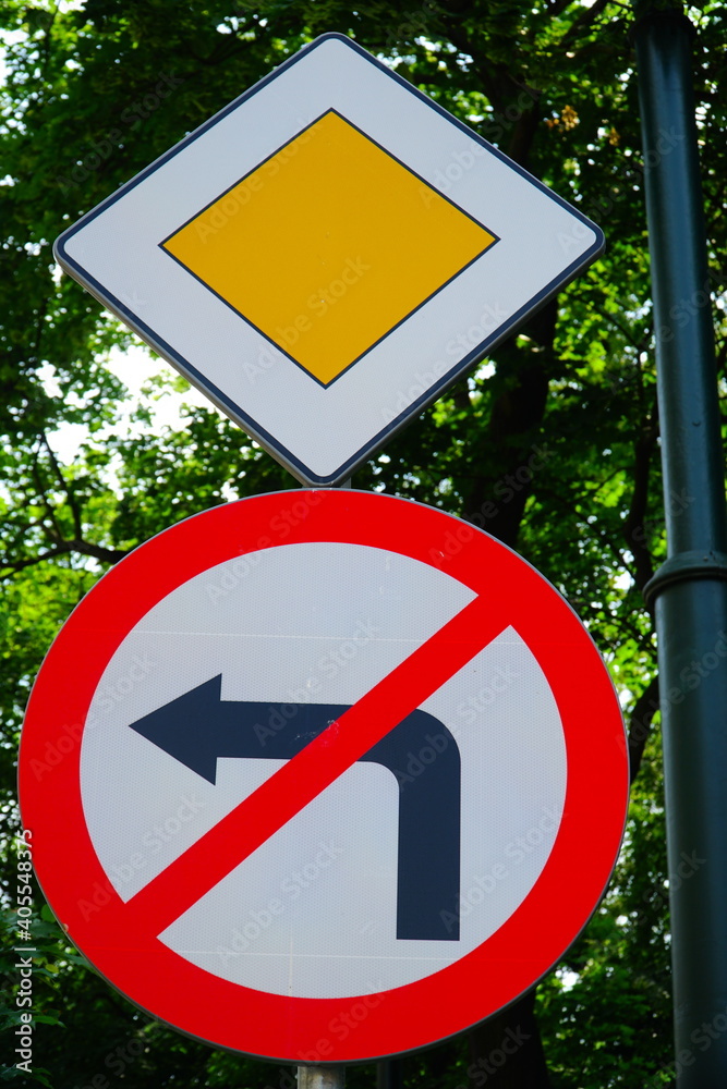 Traffic sign restricting the driving direction on the left and empty ...