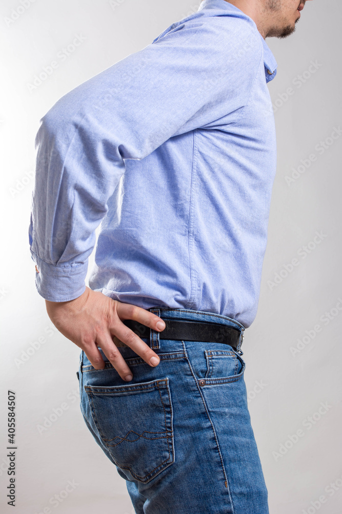 Back pain, close up middle aged man has injury during years of sitting ...