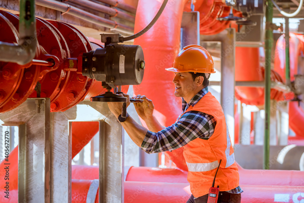 Engineer under checking the industry cooling tower air conditioner is ...