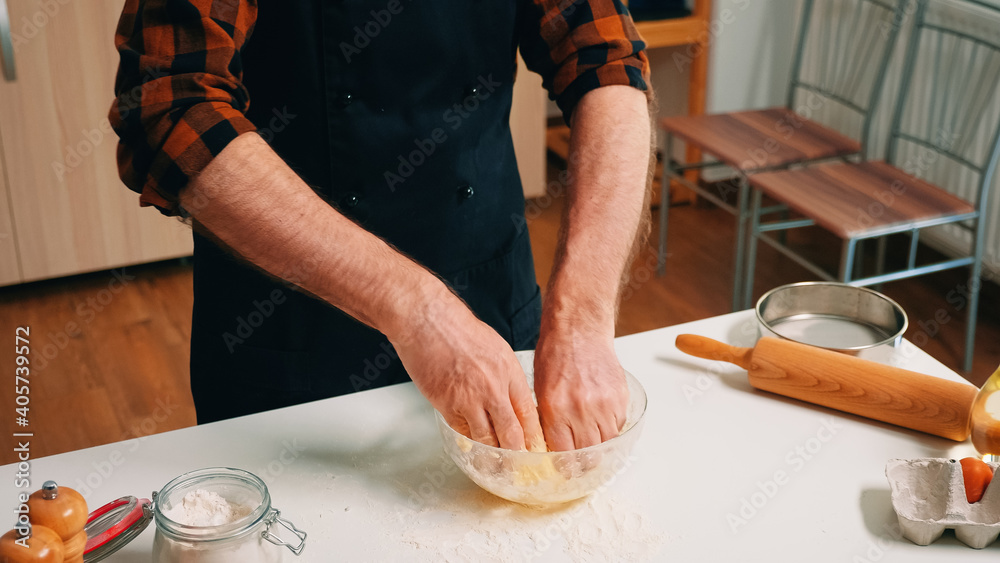 Process of preparing the pastry dough made by man baker. Retired ...