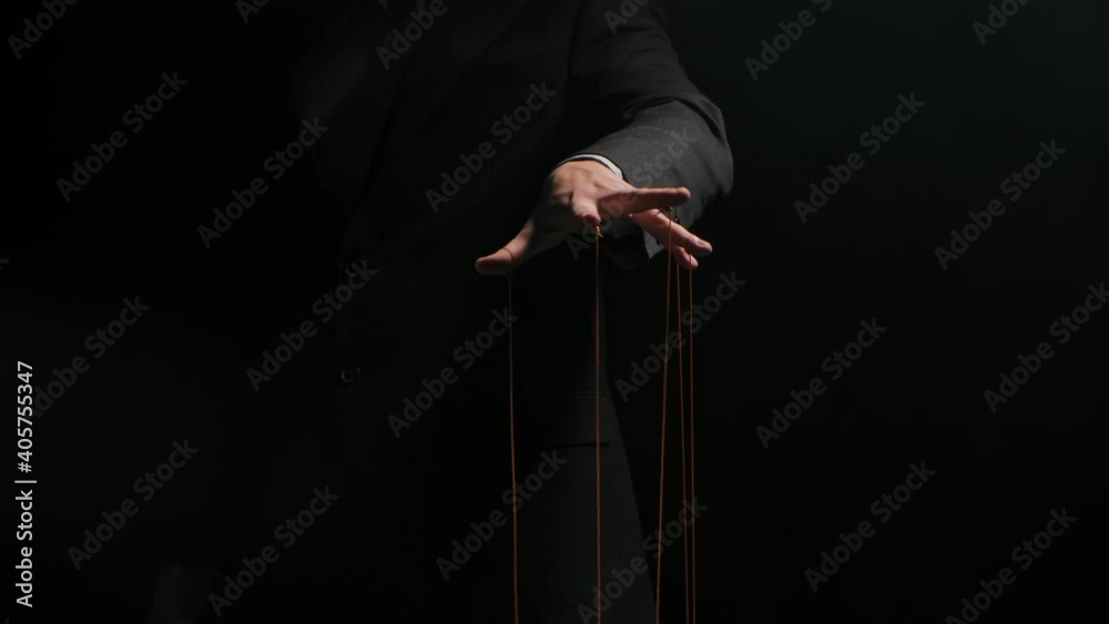 Puppet Master controls and manipulates the puppets with strings ...