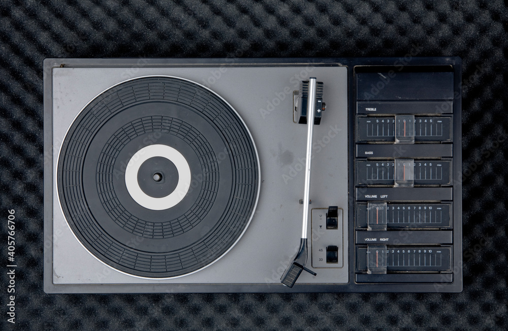 Vintage turntable in black foamy background. Stock Photo | Adobe Stock