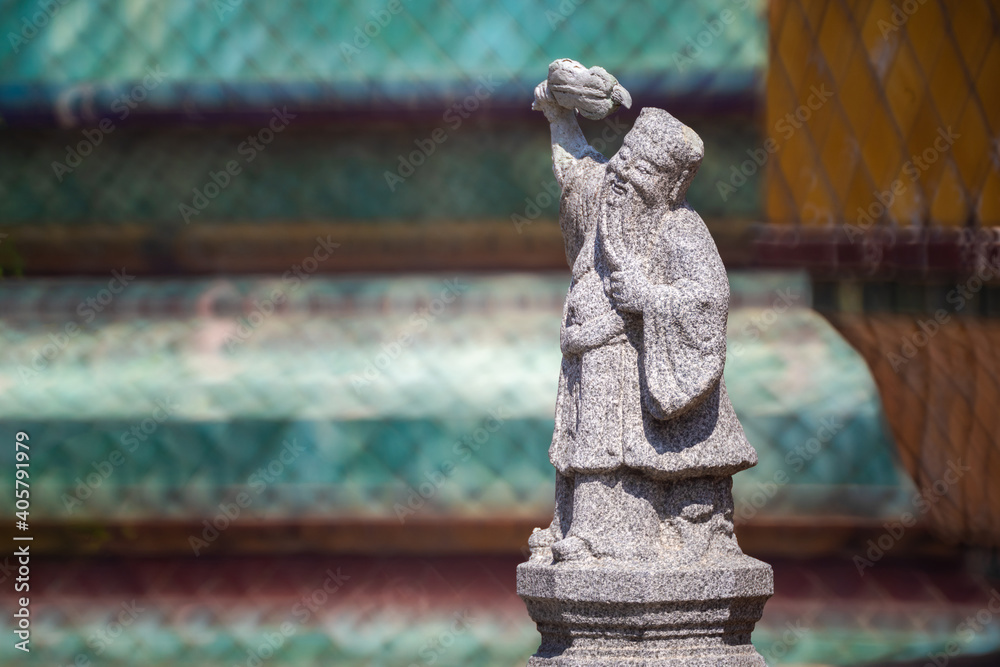 Ancient Chinese people figure stone doll carvings decorated at pagoda ...