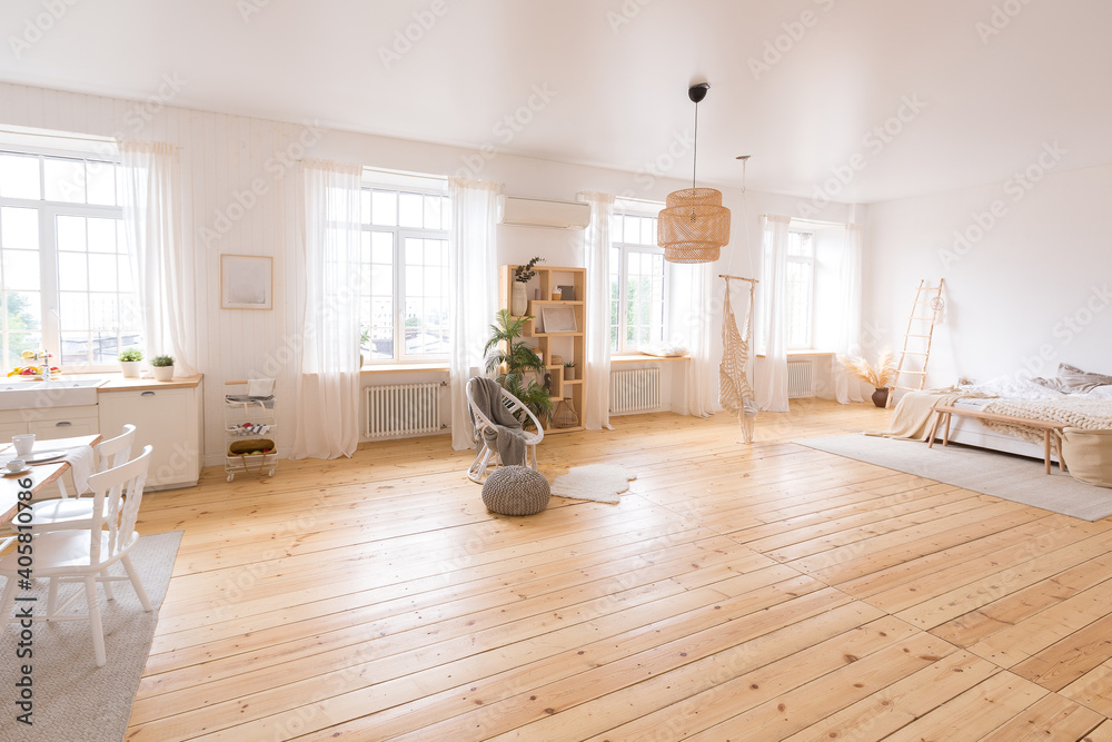 cute cozy light interior design of the apartment with a free layout of ...