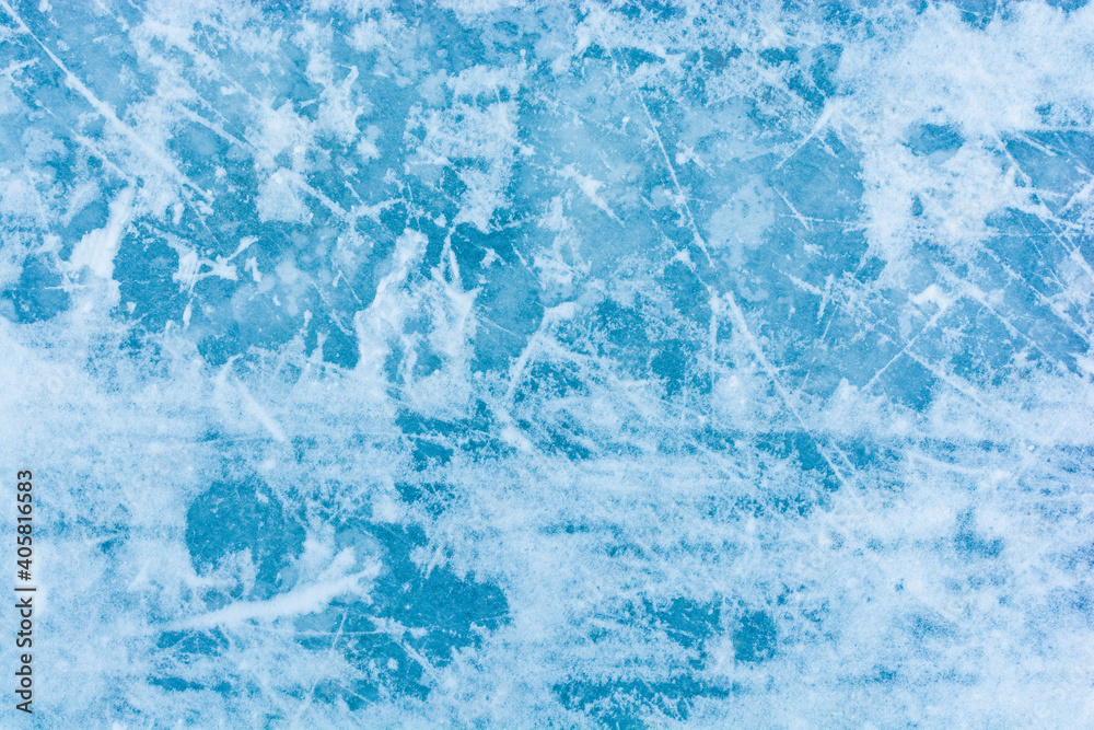 Ice blue background with skate tracks. Skating rink. Frozen water, sea ...