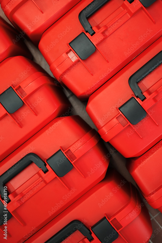 Red packing plastic boxes cases for geodetic total stations. Vertical ...