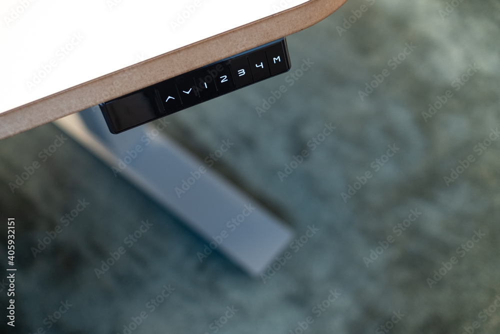 Adjustable office table with up, down and memory buttons on the remote ...