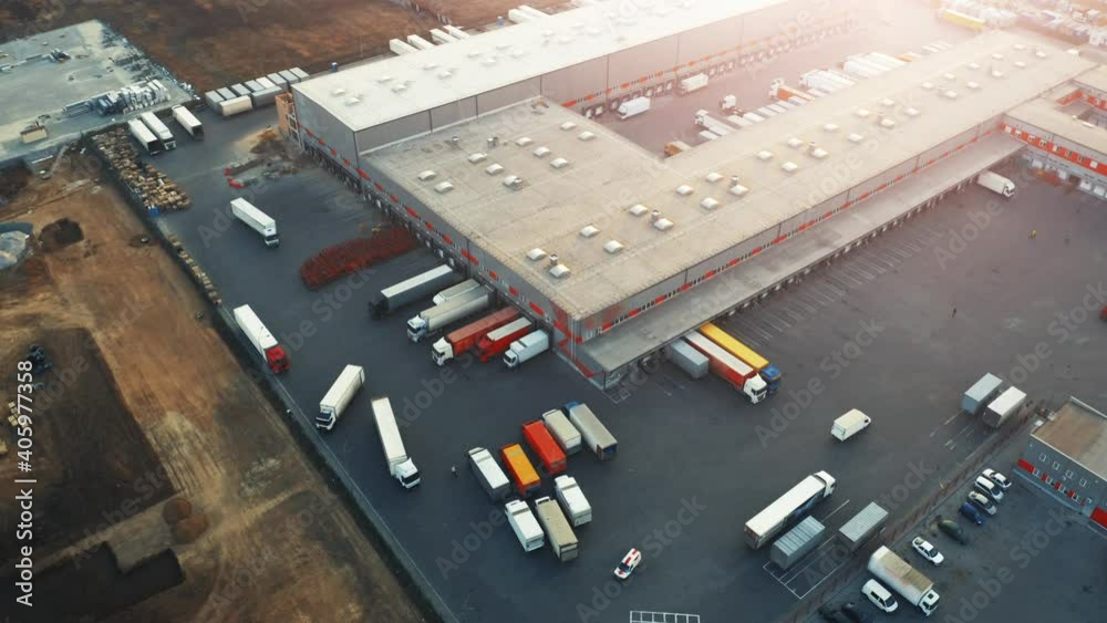 Logistics park with warehouses, loading hub and a lot of semi-trailer ...