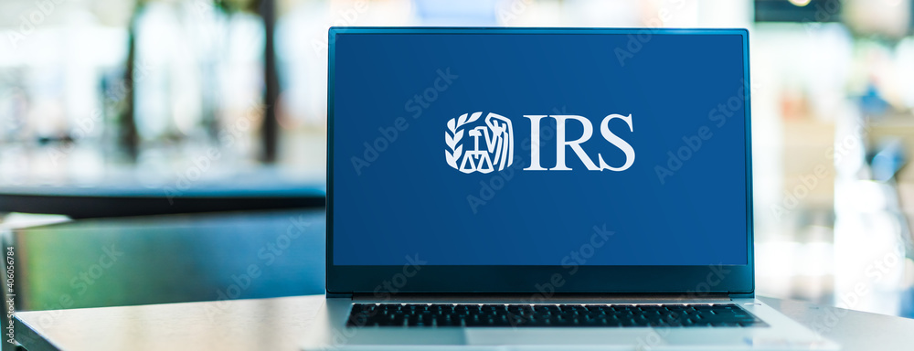 Laptop computer displaying logo of The Internal Revenue Service Stock ...