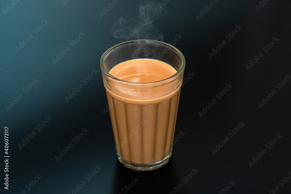 Fresh milk tea or Indian Kadak Chai. Stock Photo | Adobe Stock