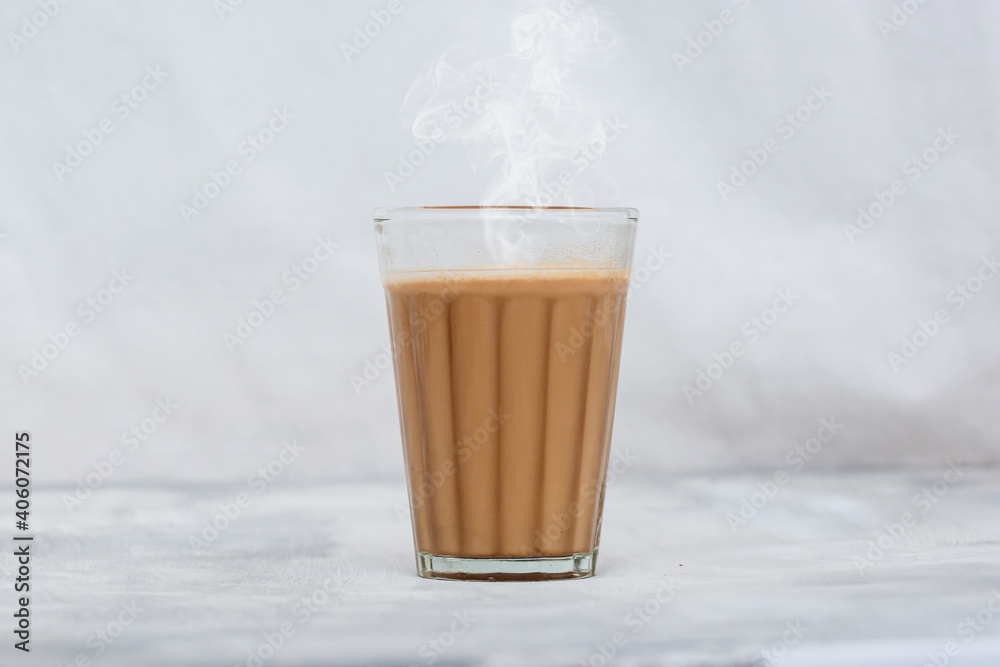 Fresh milk tea or Indian Kadak Chai. Stock Photo | Adobe Stock