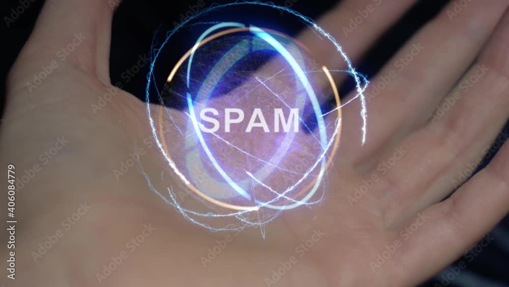 Spam text in a round conceptual hologram on a female hand. Close-up of ...
