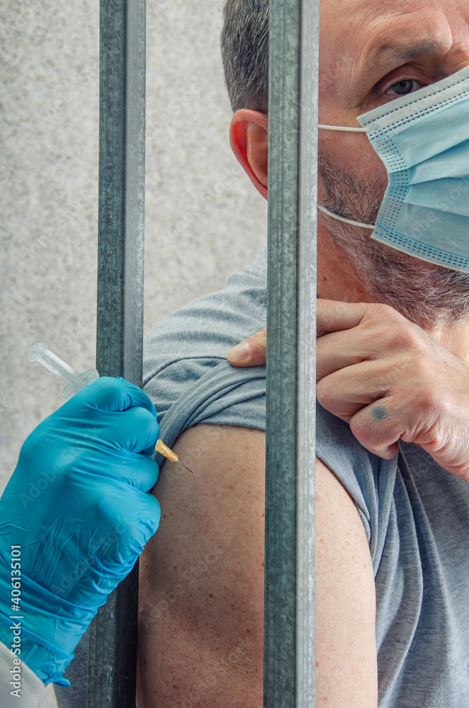 Prison Health Protocols: Middle-Aged Inmate Receives Antiviral Vaccine ...