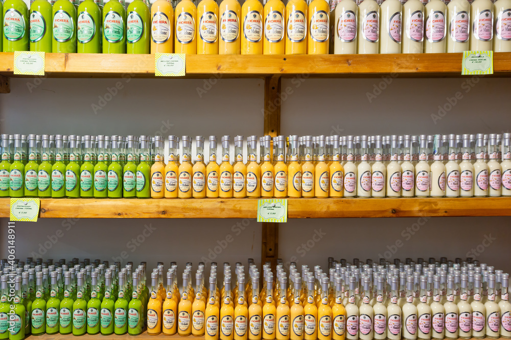 Liquor store with display of local bottles liqueur, Taormina, Sicily ...