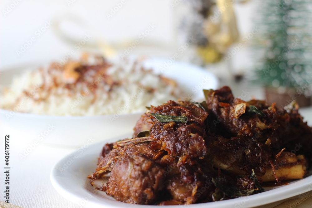 Poster Aromatic traditional Ghee rice and spicy mutton roast prepared ...