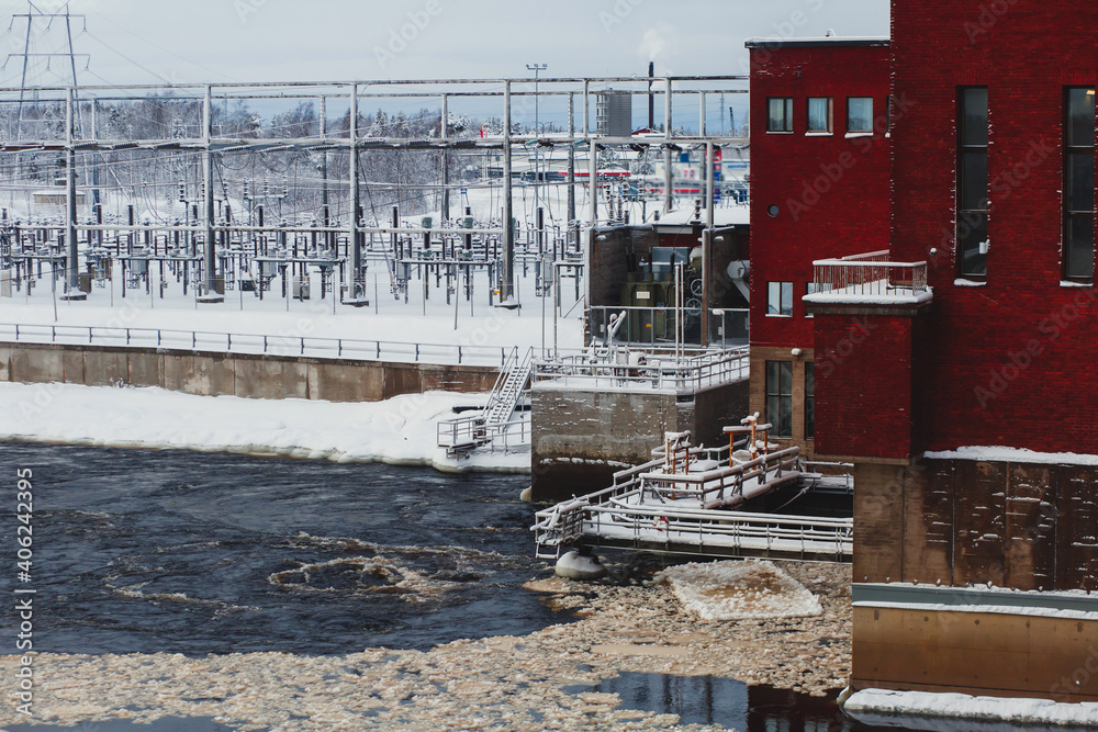 Winter view of Hydroelectric Power Plant with a dam in Lapland, Finland ...