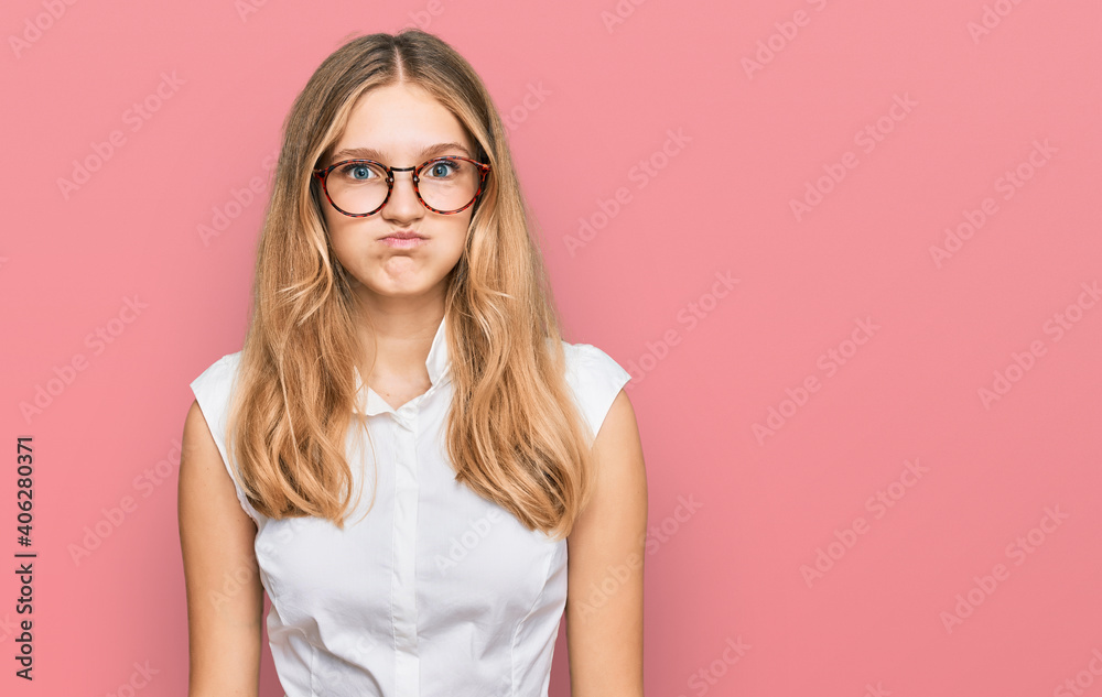 Beautiful young caucasian girl wearing casual clothes and glasses ...