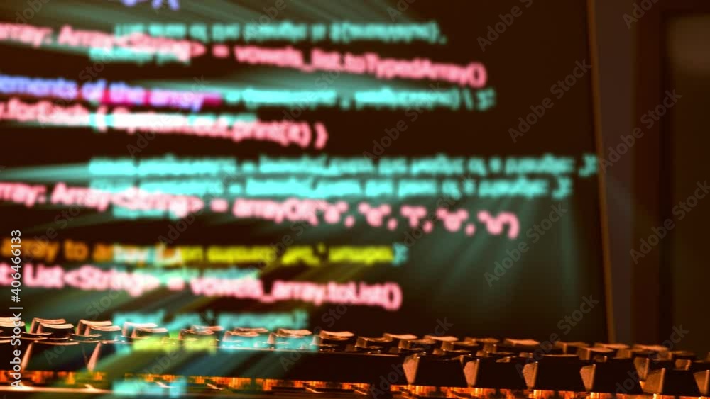 Computer screen and keyboard displaying programing code from a virus or ...